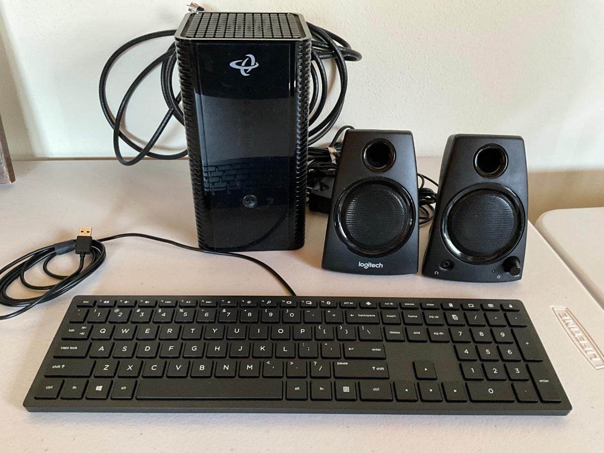 Router, Logitech Speakers, Keyboard | EstateSales.org