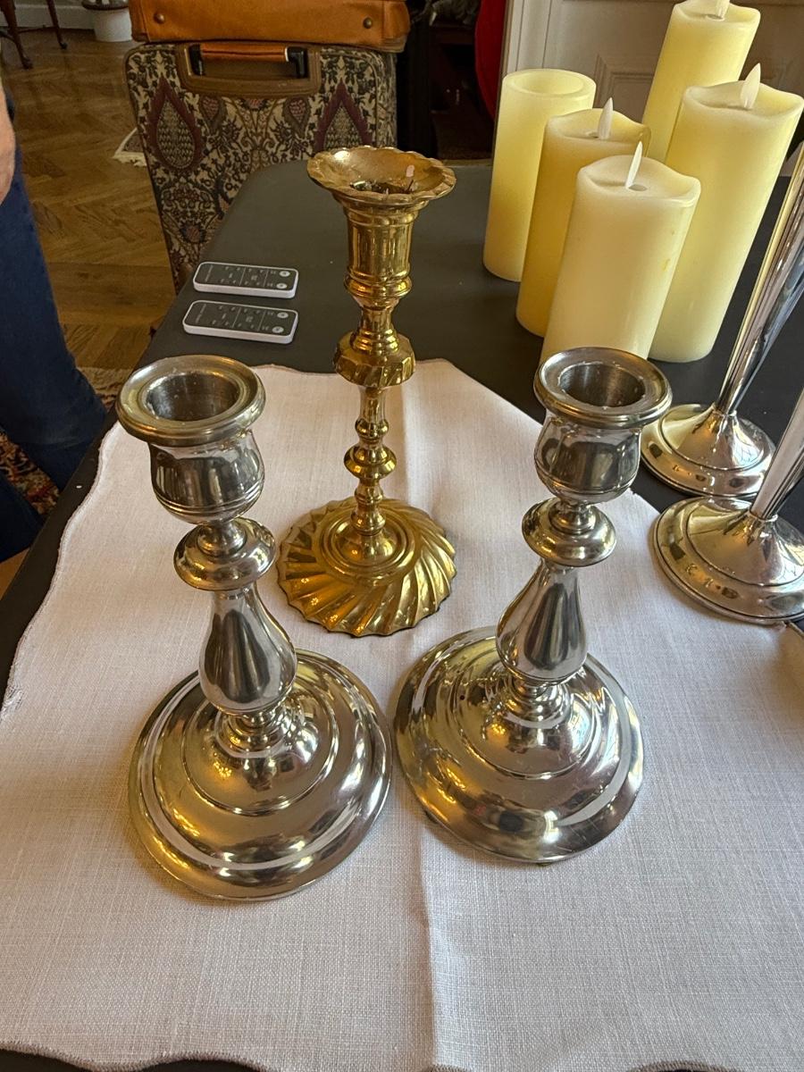 1 brass candlestick and a pair of pretty silver plate candlesticks ...