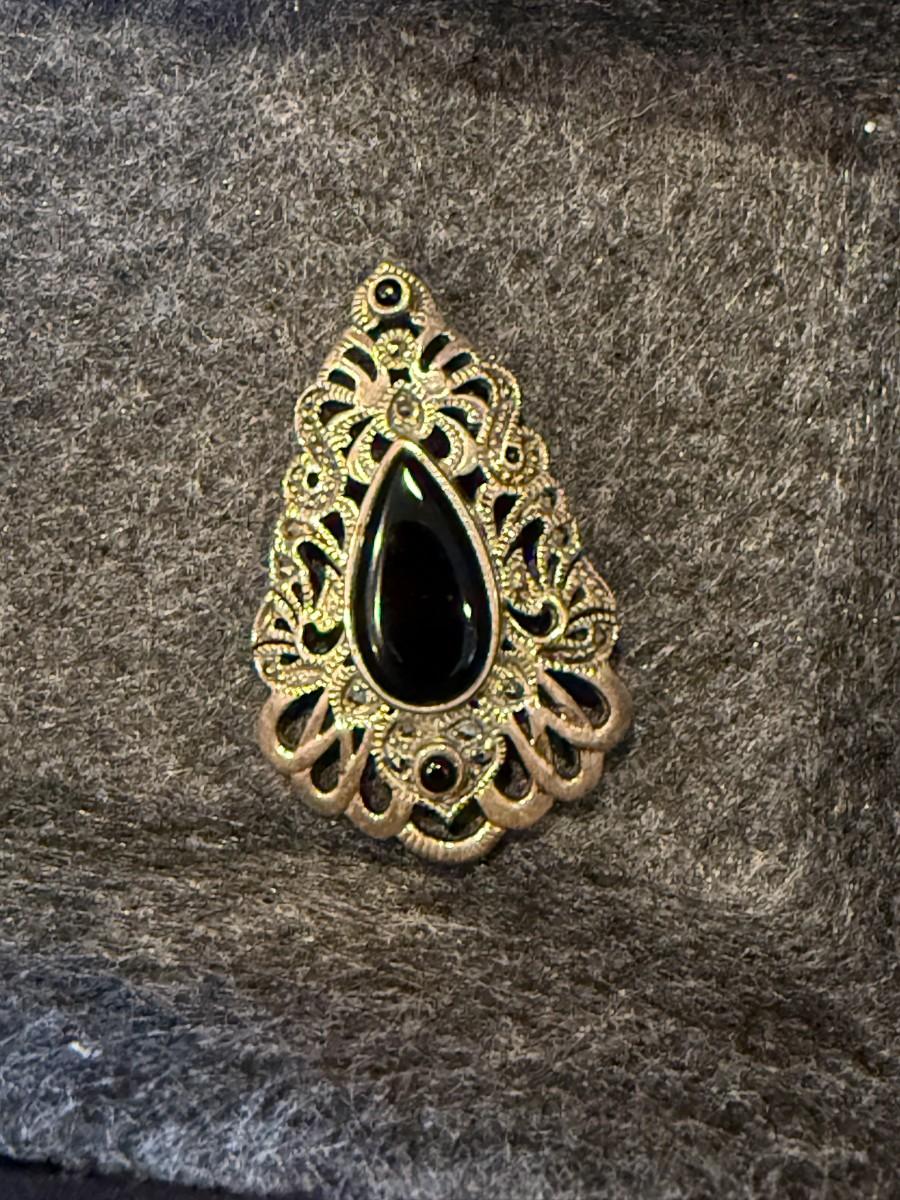 Black and Silver tear drop pin | EstateSales.org