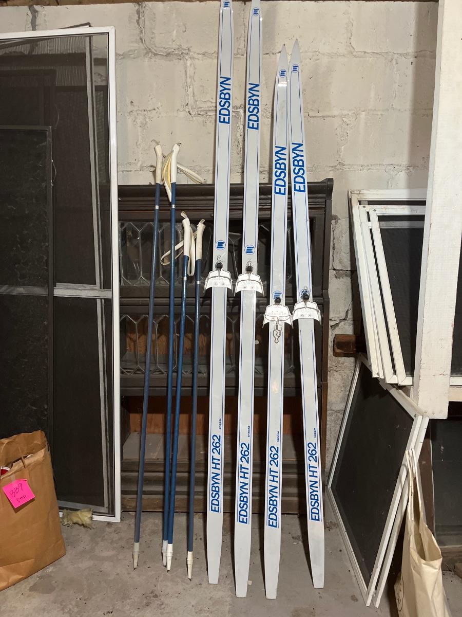 Two sets of EDSBYN cross country skis with poles | EstateSales.org