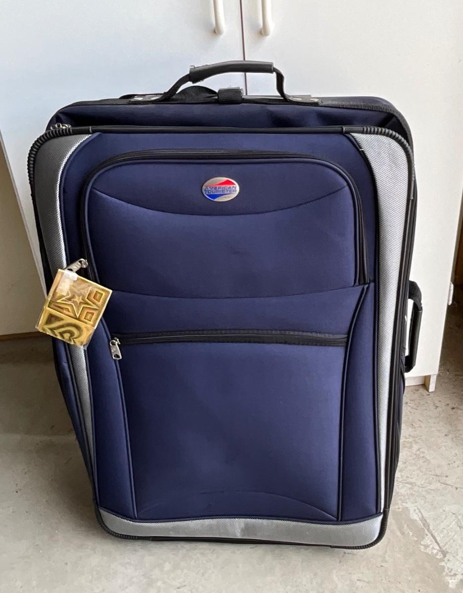 American Tourist luggage | EstateSales.org