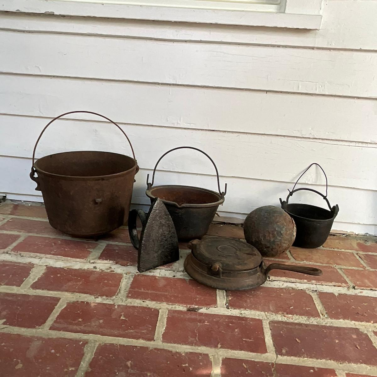 P648 Lot of Iron Buckets & Assorted Iron Pieces | EstateSales.org