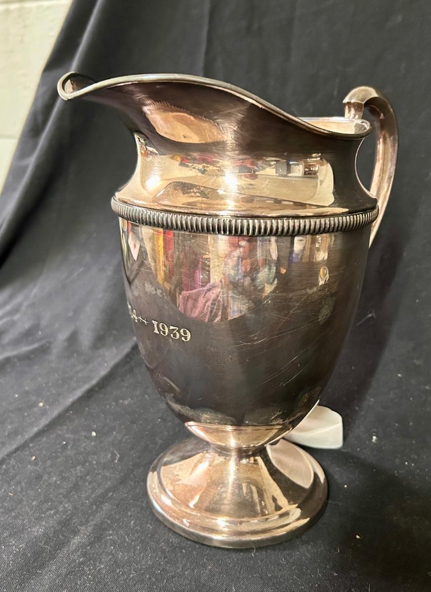 Silverplate 25th anniversary pitcher | EstateSales.org