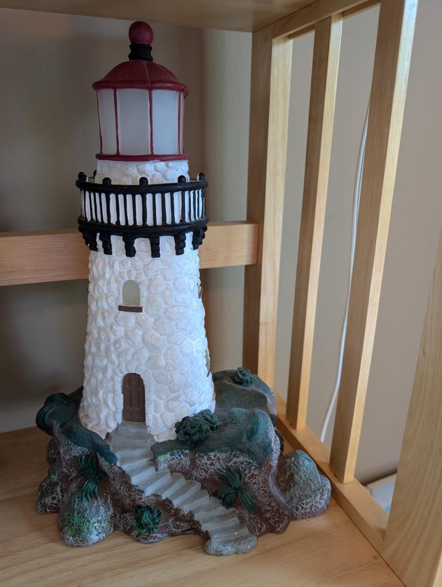 Lighthouse Figure | EstateSales.org