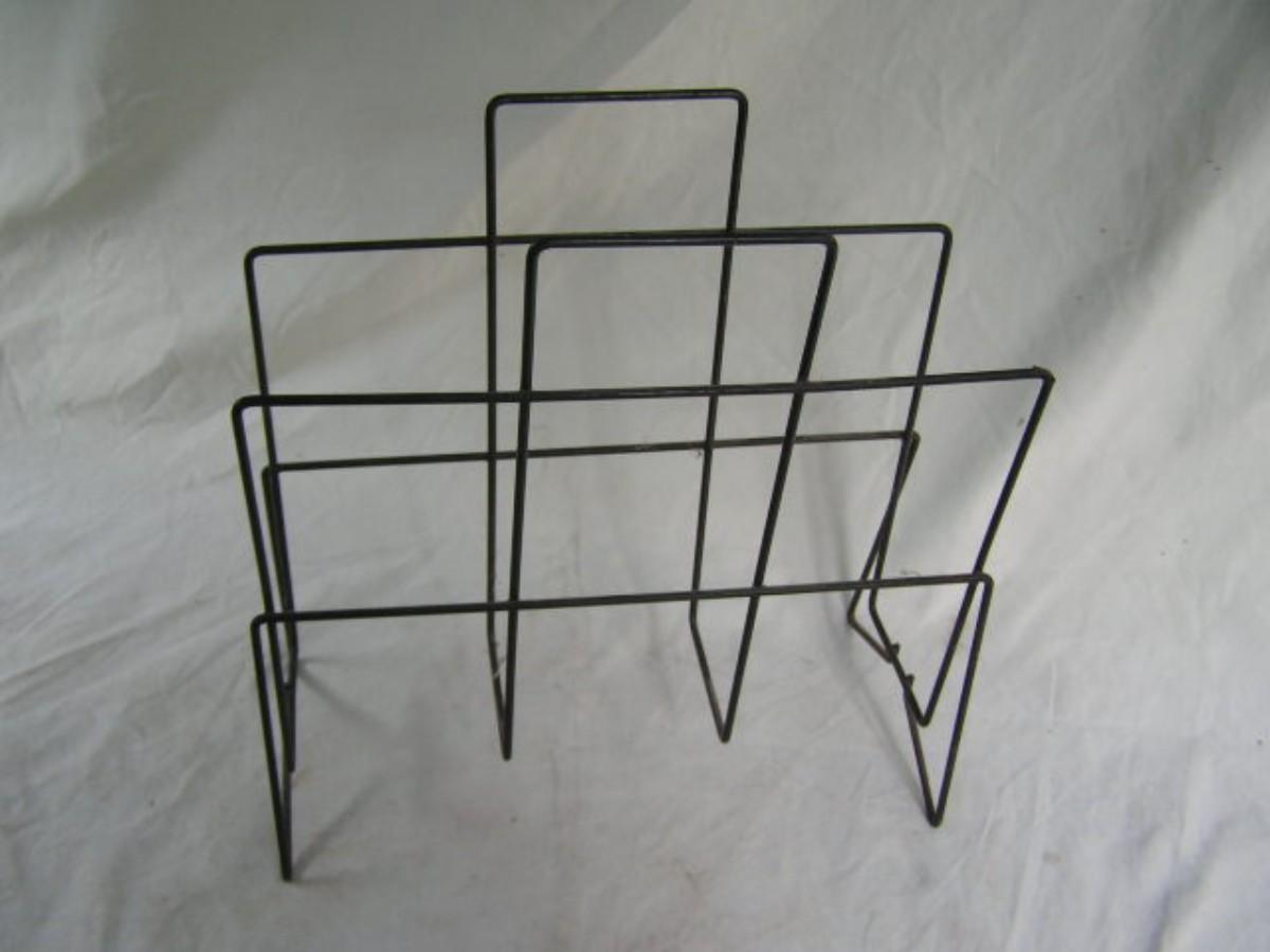 A wire magazine rack | EstateSales.org