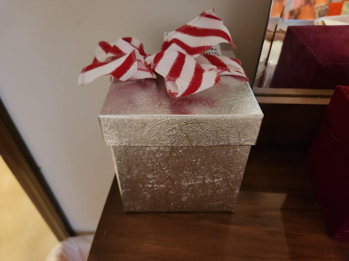 Silver Box w/ Peppermint Striped Bow | EstateSales.org