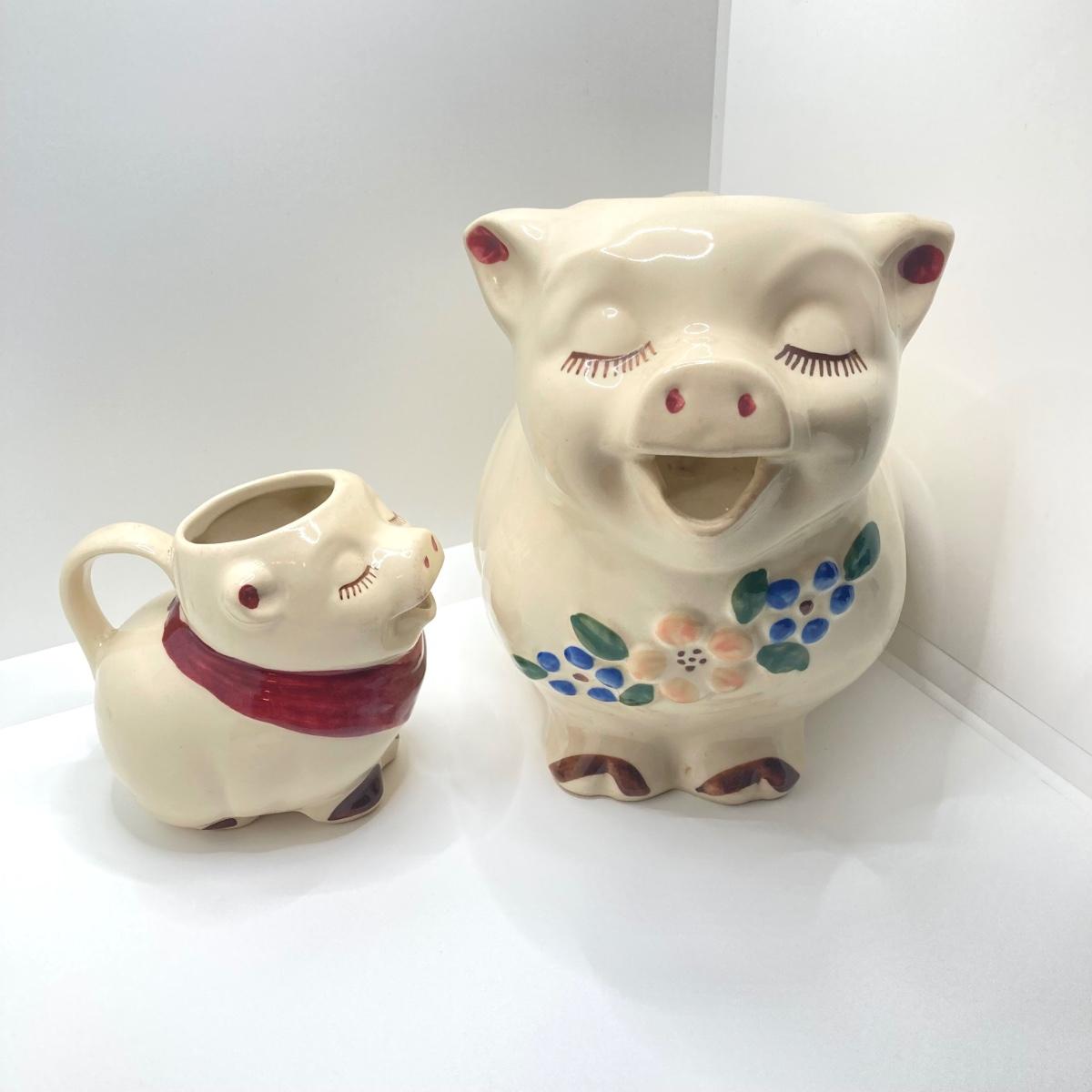 LOT 195: Vintage Shawnee USA Smiley Pig Pitchers | EstateSales.org
