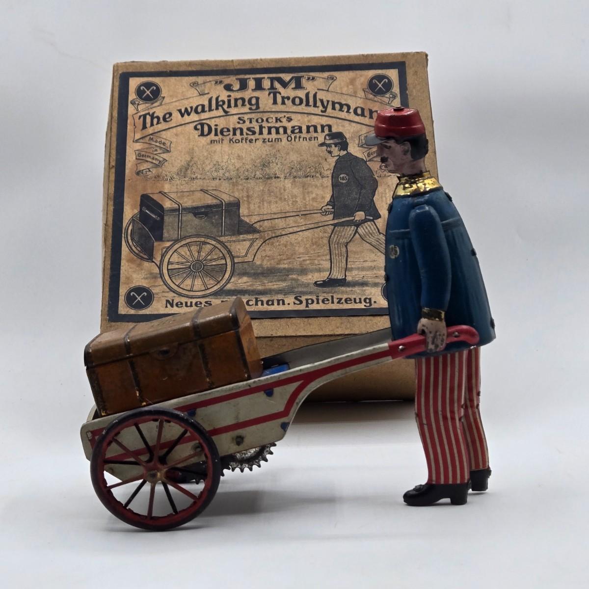 LOT 7: Antique German Tin Wind-up Toy Called Jim the Walking Trolleyman ...