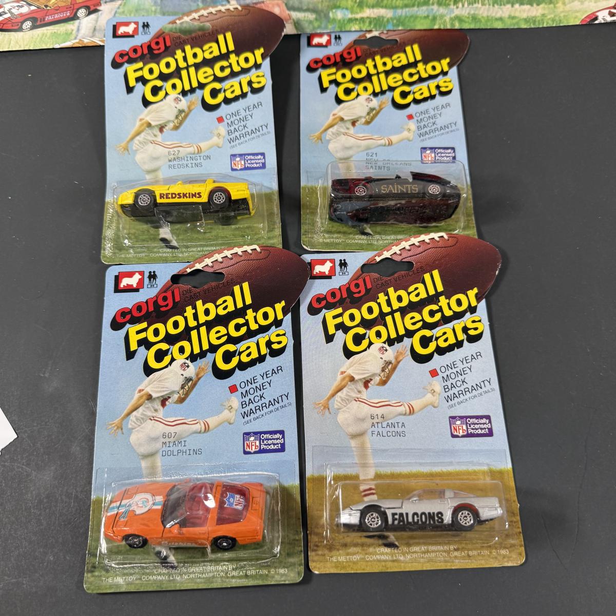 LOT 24: Vintage Corgi Football Collector Cars with Poster | EstateSales.org