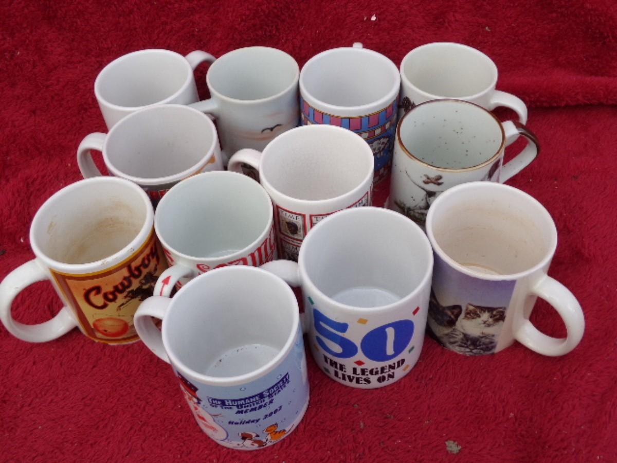 A DOZEN assorted coffee mugs/cups in a box. | EstateSales.org