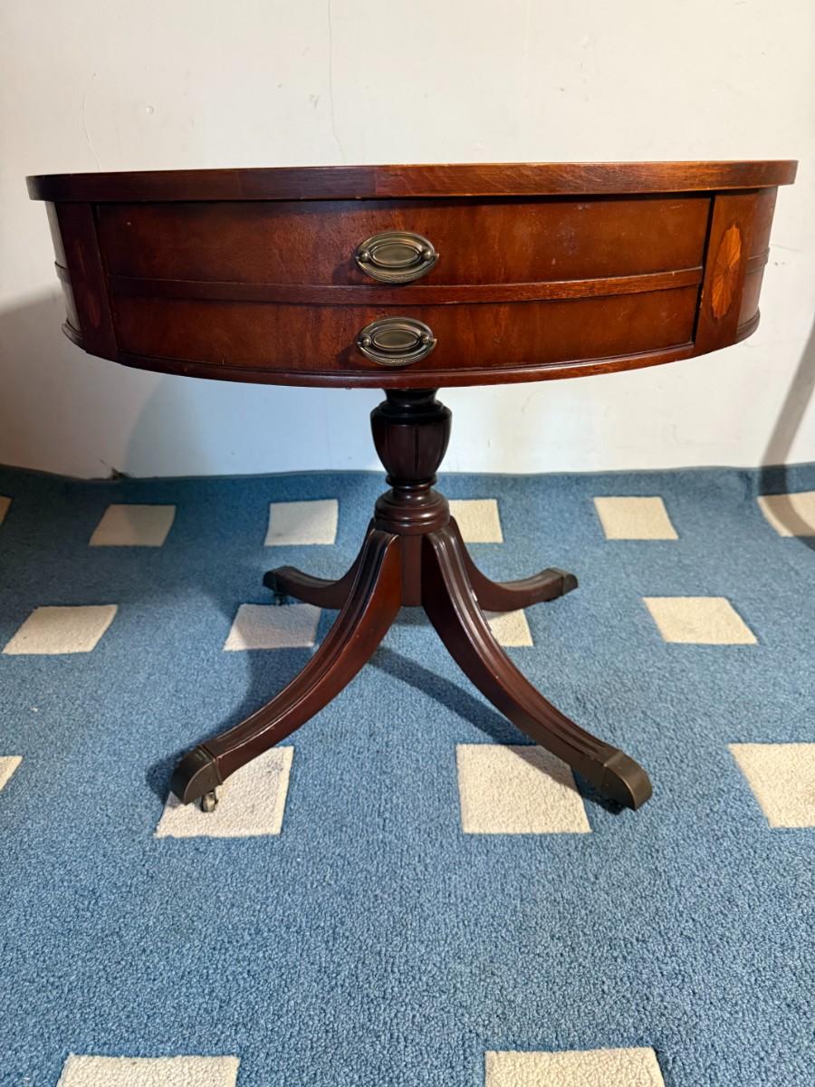 Vintage Beautiful Round Cherry Table on wheels | EstateSales.org