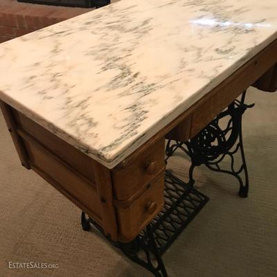 Lot 18 - Singer Sewing Marble Top Table | EstateSales.org