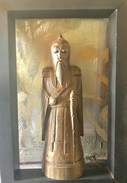 Pair of wooden Asian Emperors in hollow shadow boxes. | EstateSales.org