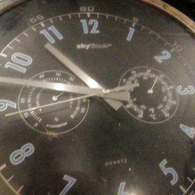 Skytimer Hygrometer/Temperature Wall Clock. | EstateSales.org