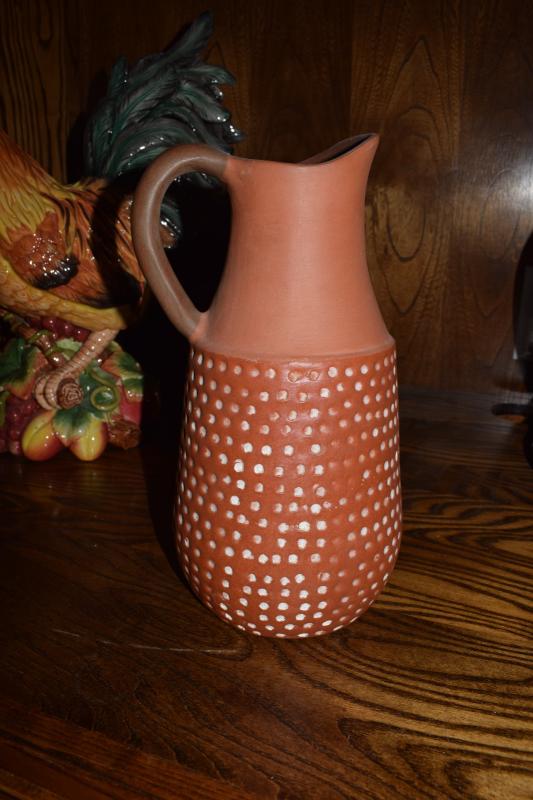 Red Clay Pitcher | EstateSales.org