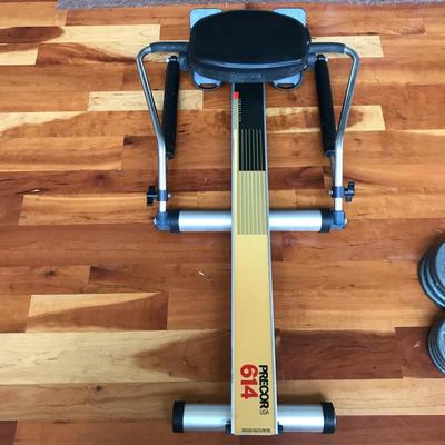 Lot 61 - Precor 614 Rowing Machine, Dumbells, Health Books and More ...