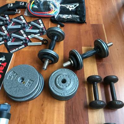 Lot 61 - Precor 614 Rowing Machine, Dumbells, Health Books and More ...