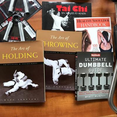 Lot 61 - Precor 614 Rowing Machine, Dumbells, Health Books and More ...