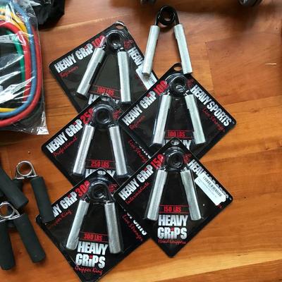 Lot 61 - Precor 614 Rowing Machine, Dumbells, Health Books and More ...