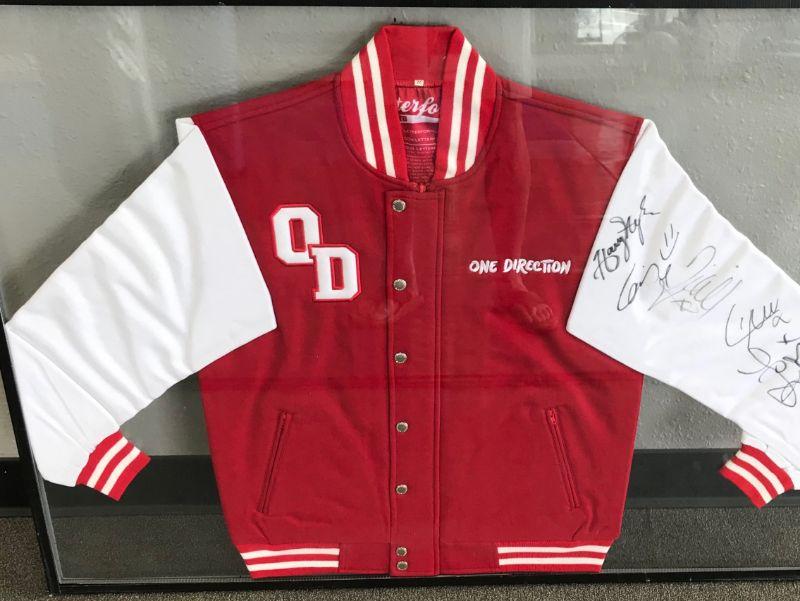 "One Direction" Autographed Jacket | EstateSales.org