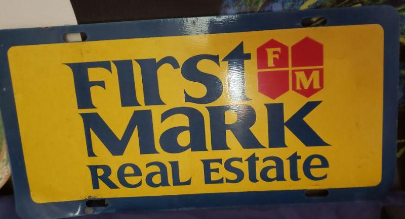 First Mark Real Estate License Plate | EstateSales.org