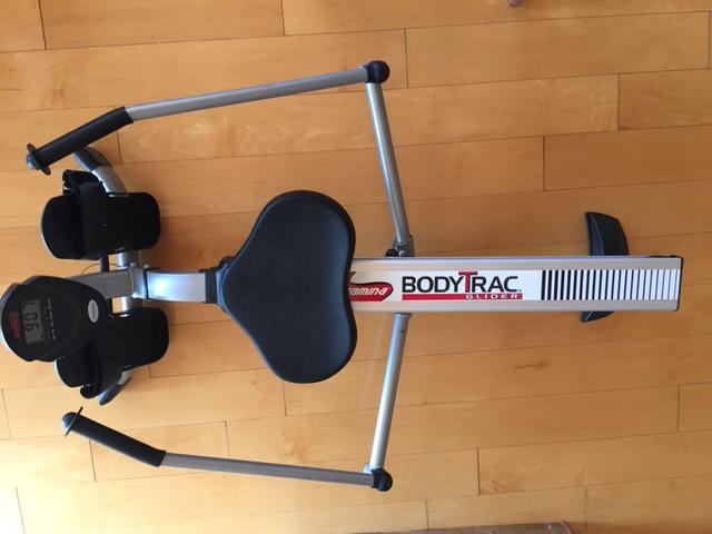 Lot 1069: Body Track Glider Rowing Machine. See additional photo that ...