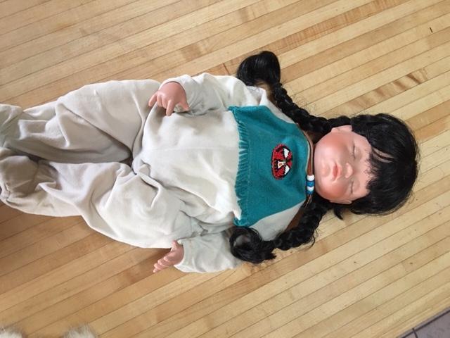 Lot 011: Native American Sleeping Baby | EstateSales.org