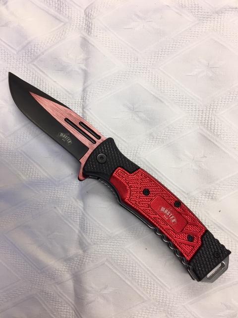 Lot 056: Collectible Knife, Red Handle, red tint blade | EstateSales.org
