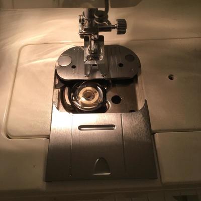 Lot 151 - Singer Portable Sewing Machine | EstateSales.org