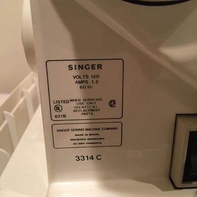 Lot 151 - Singer Portable Sewing Machine | EstateSales.org