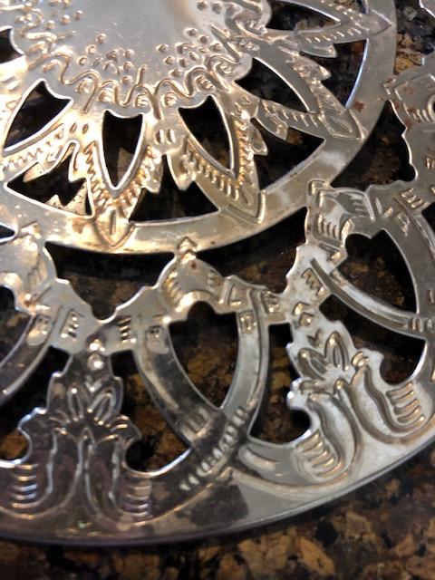 Metal Trivet | EstateSales.org