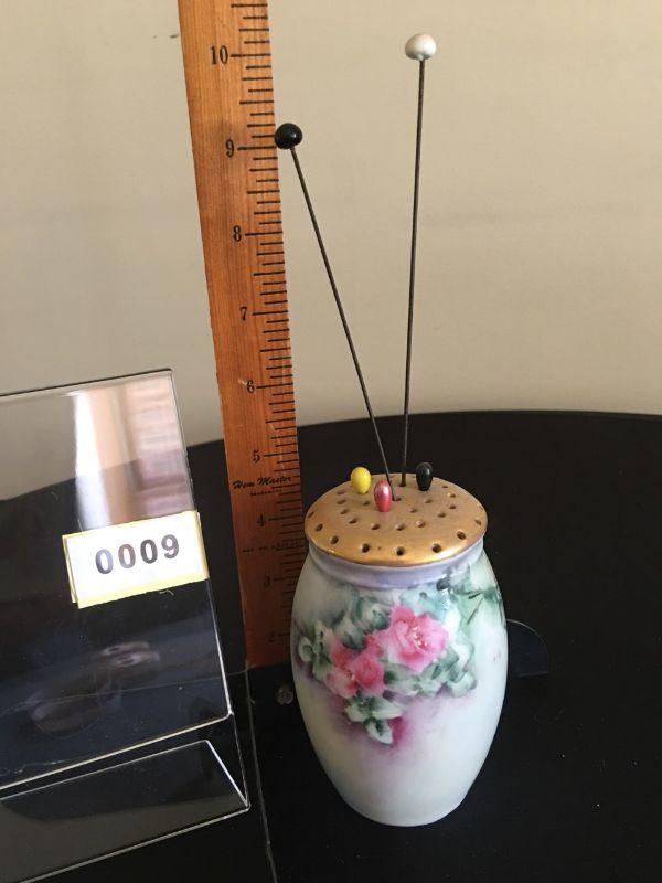 Porcelain hat pin jar complete with hat pins | EstateSales.org