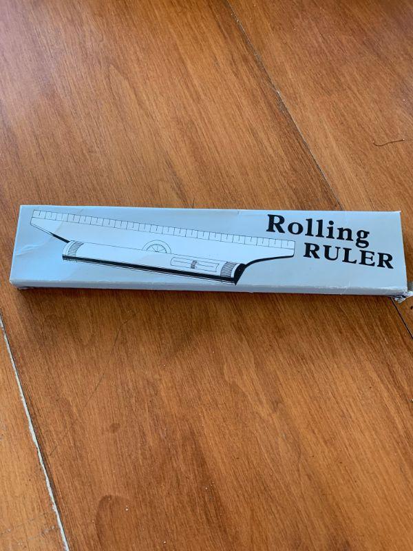 Rolling ruler in box | EstateSales.org