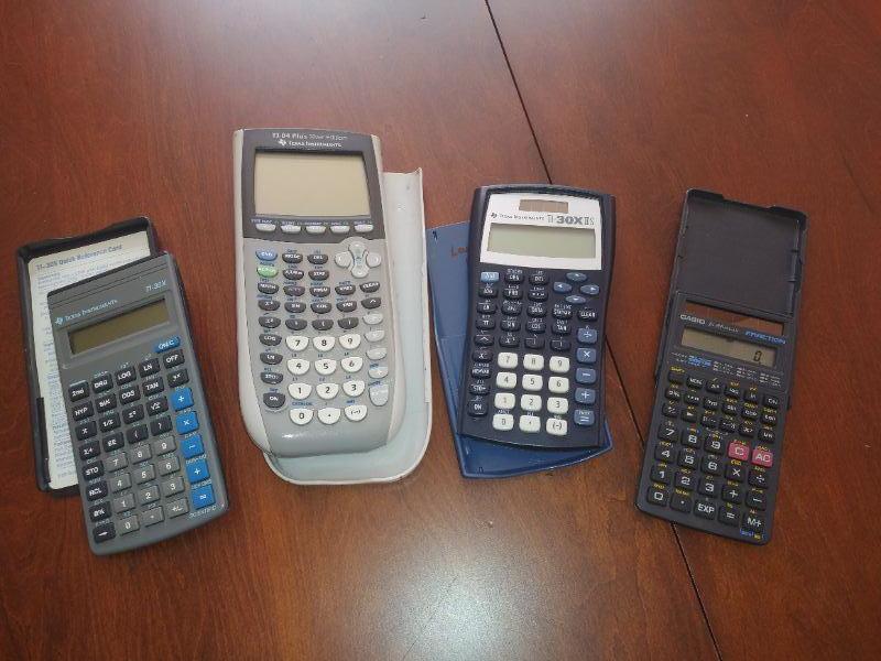 Lot of 4 calculators | EstateSales.org