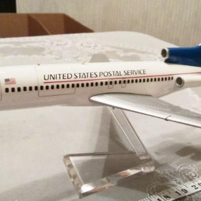 LOT 114 USPS 727 PLANE | EstateSales.org