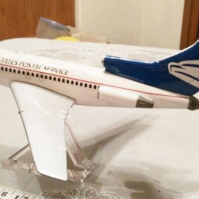 LOT 114 USPS 727 PLANE | EstateSales.org