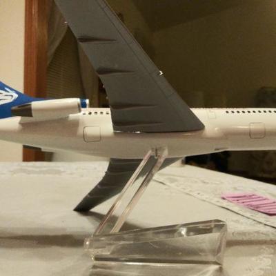 LOT 114 USPS 727 PLANE | EstateSales.org