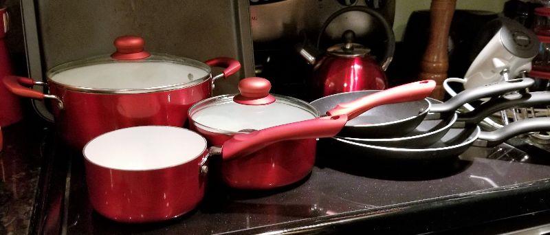 #111 - Red pans all have lids . | EstateSales.org