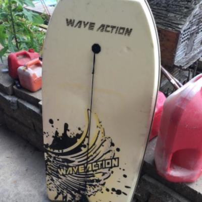 Wave action boogie board and life vest | EstateSales.org