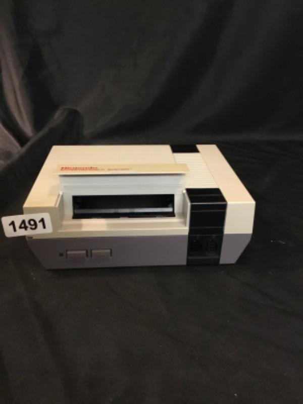 Nintendo NES 001 (refurbished) Lot 1491 | EstateSales.org