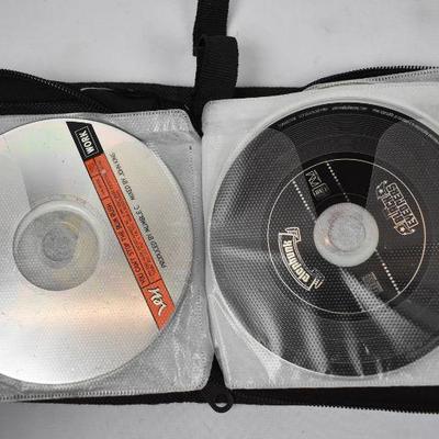 Red CD Case with 15 Music CDs | EstateSales.org