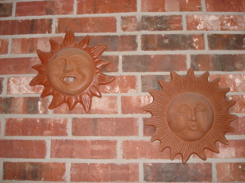 2 Large Terra Cotta wall Sun Faces | EstateSales.org