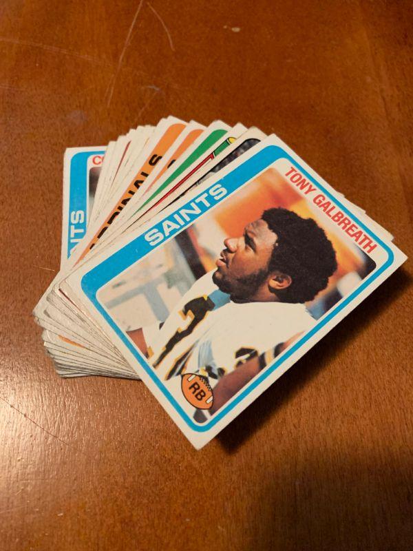 Stack of older football cards | EstateSales.org
