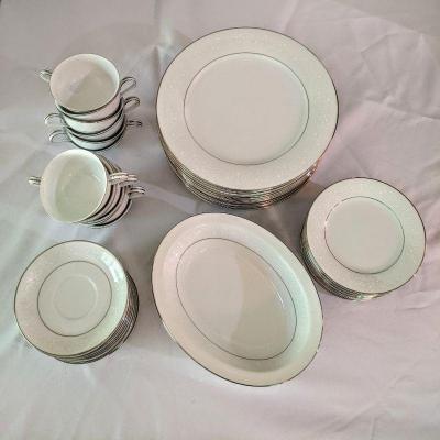 Lot 159 - Noritake China Set & Silver Rimmed Glassware | EstateSales.org