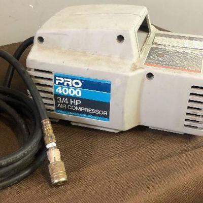 Lot #62 PRO 4000 3/4 HP AIR COMPRESSOR | EstateSales.org