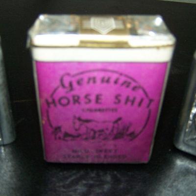 LOT 195 ENAMEL SIGN & HORSE SH*T CIGARETTES | EstateSales.org