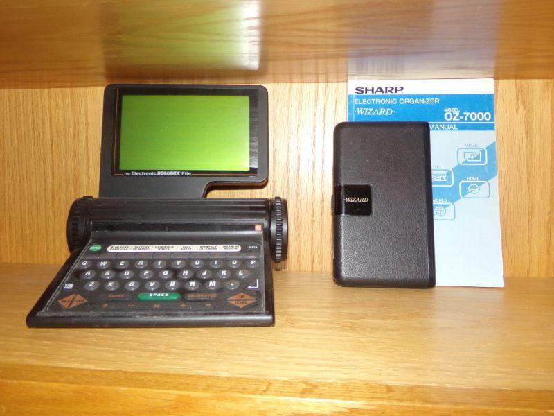 LOT 106 ELECTRONIC ROLODEX & SHARP WIZARD | EstateSales.org