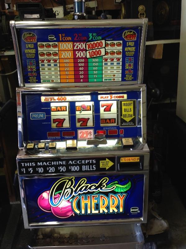 Vintage black cherry machine | EstateSales.org