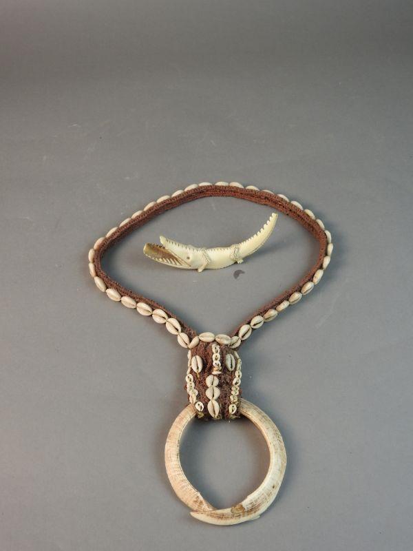 Lot 219 - Oceanic Cowrie Shell and Boar Tusk Necklace / Period and ...