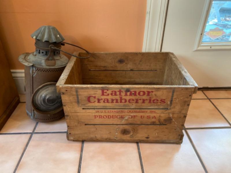 476: Antique Cranberry Crate With Lantern | EstateSales.org